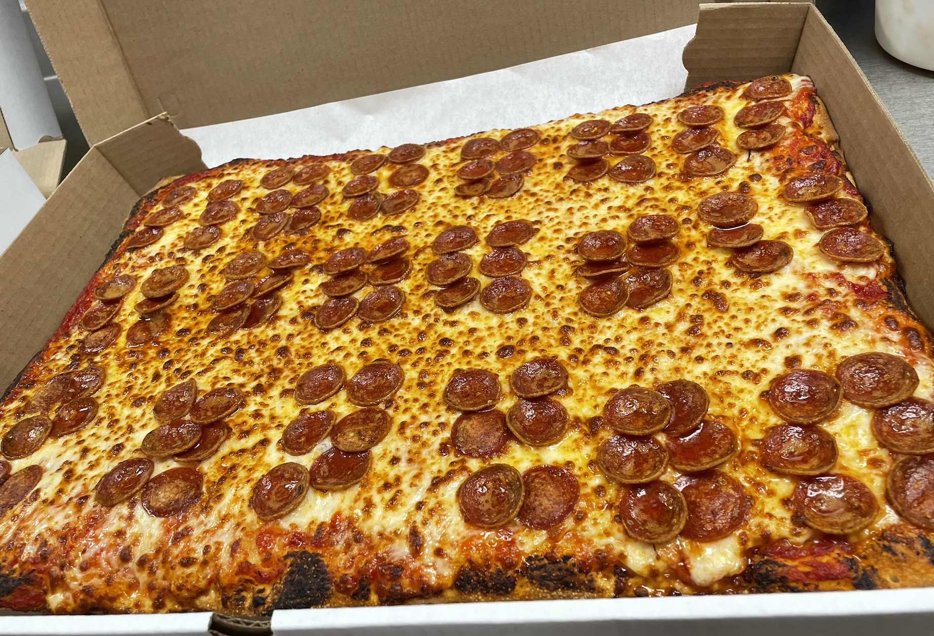 Party-Cut vs. Triangle-Cut Pizza: The Better Slice